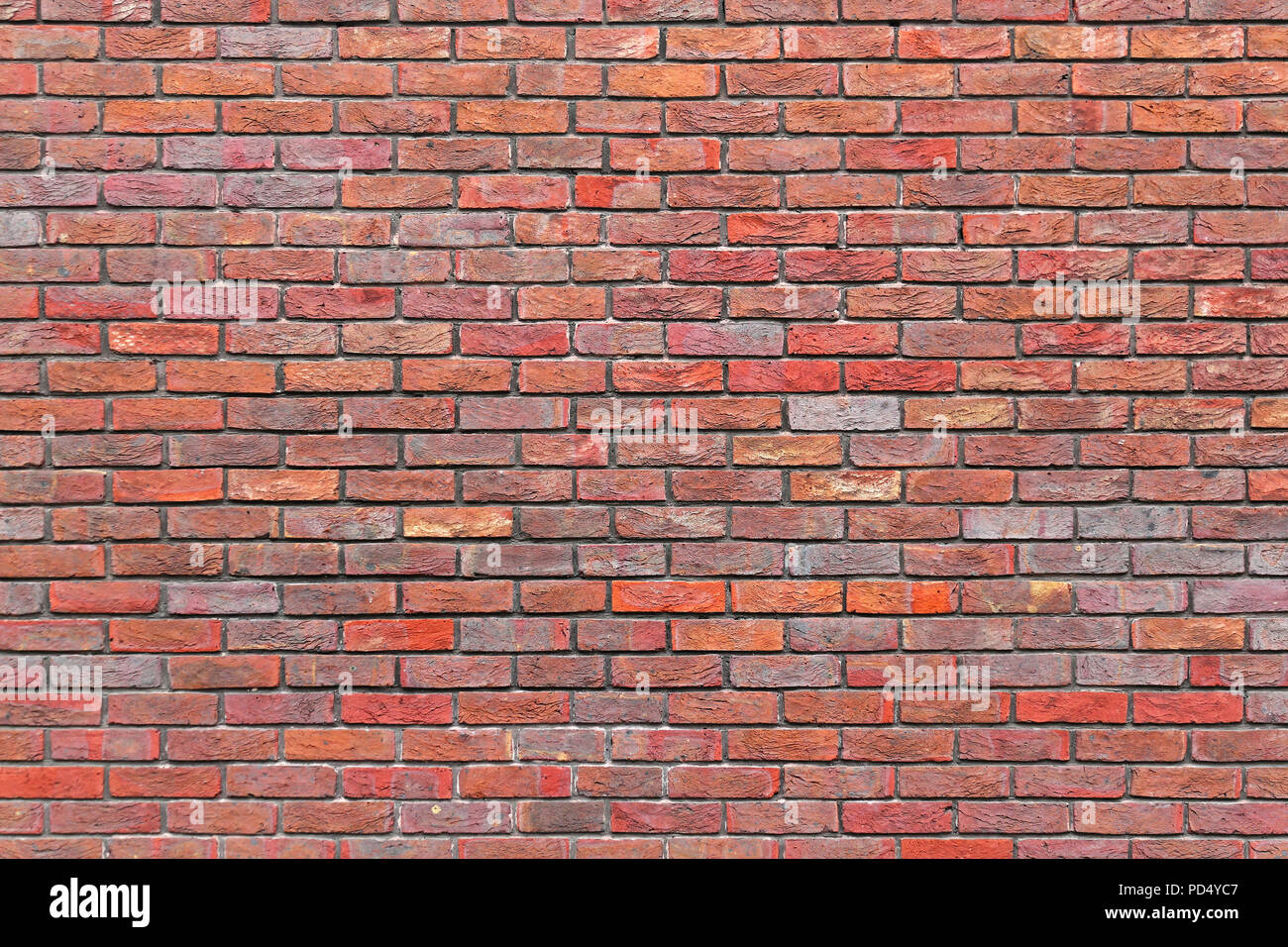 Red brick wall with rough texture Stock Photo - Alamy