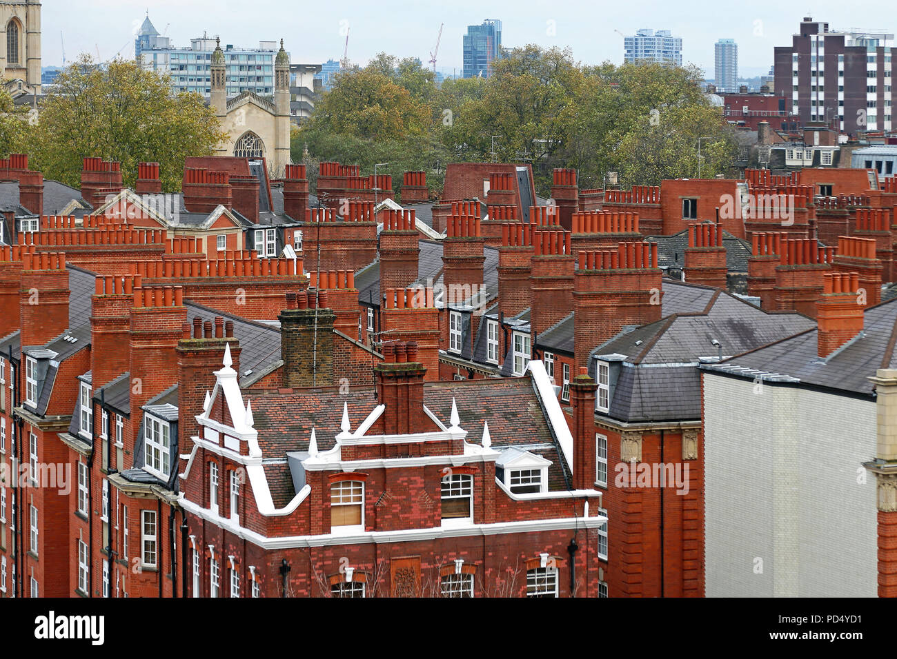 Rows of brick chimney pots in West London Stock Photo - Alamy