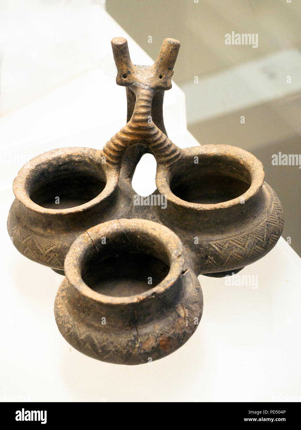 Multiple pot with human-shaped handle. Second half of the ninth century ...