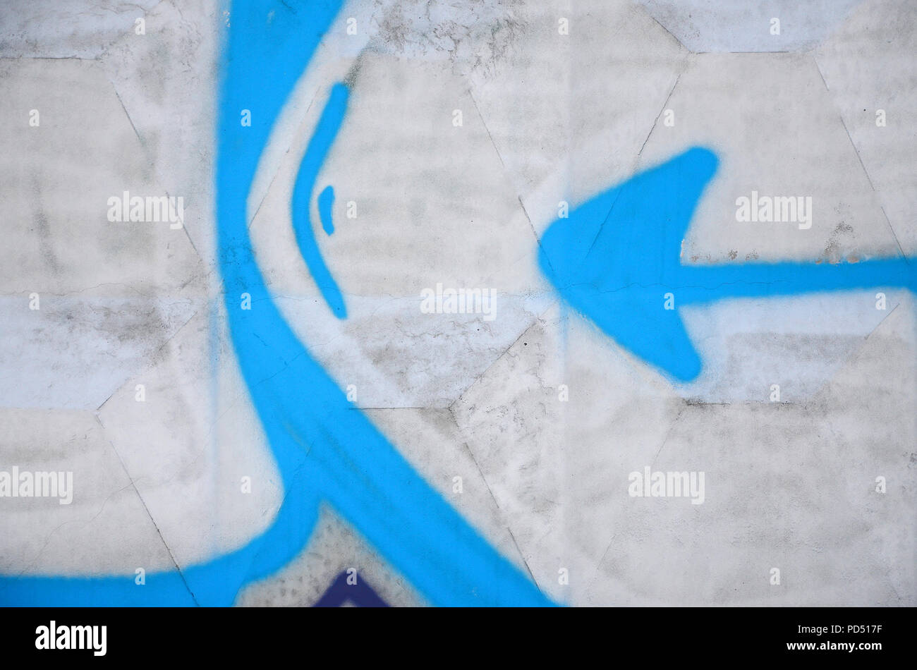 The old wall, painted in color graffiti drawing red aerosol paints ...