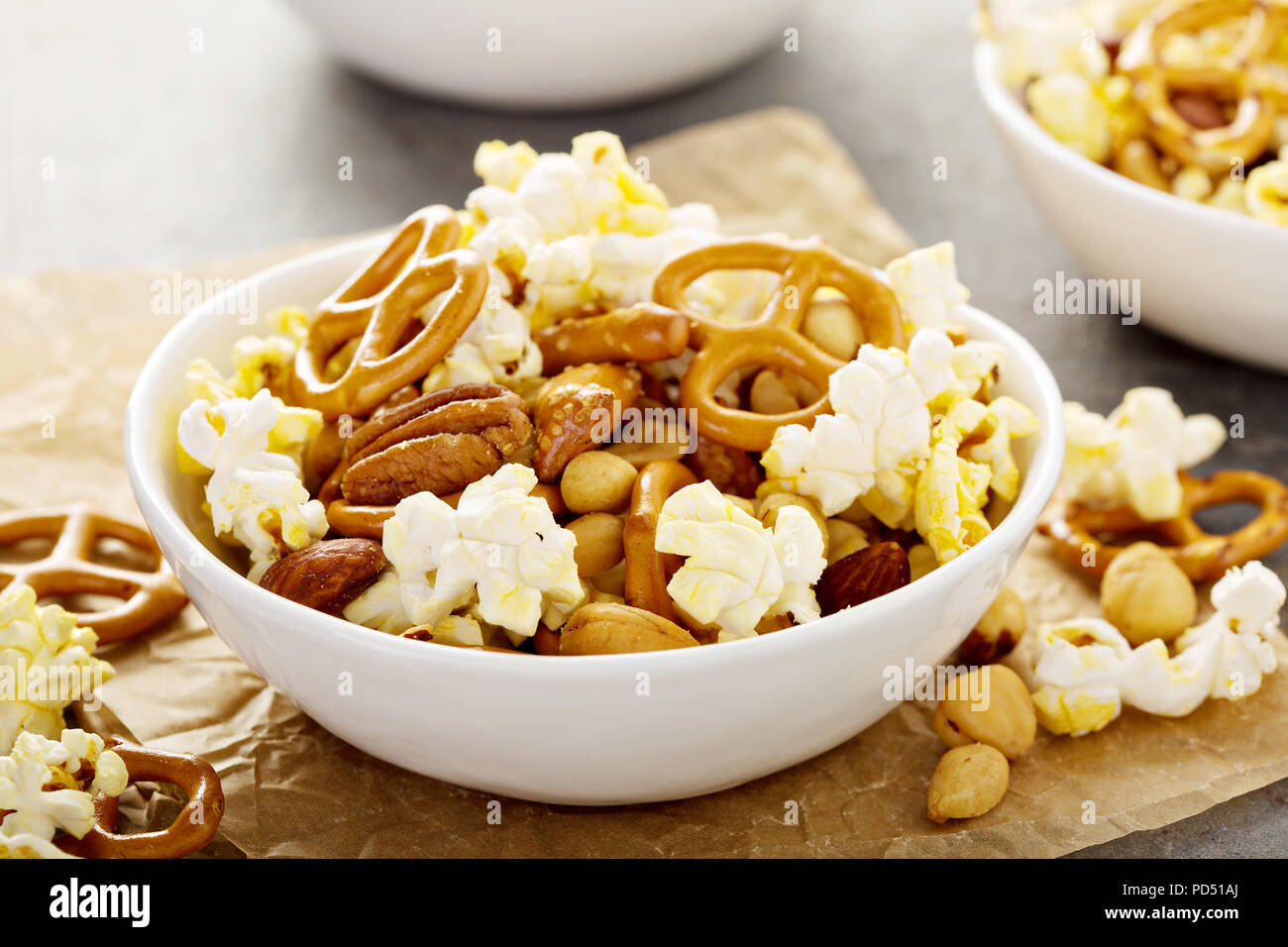 Trail mix with nuts, popcorn and pretzels Stock Photo - Alamy