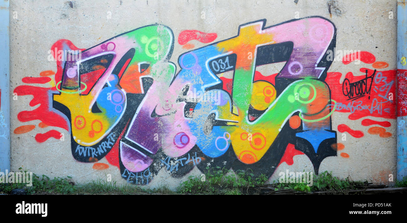The texture of the wall with graffiti, which is depicted on it. The ...