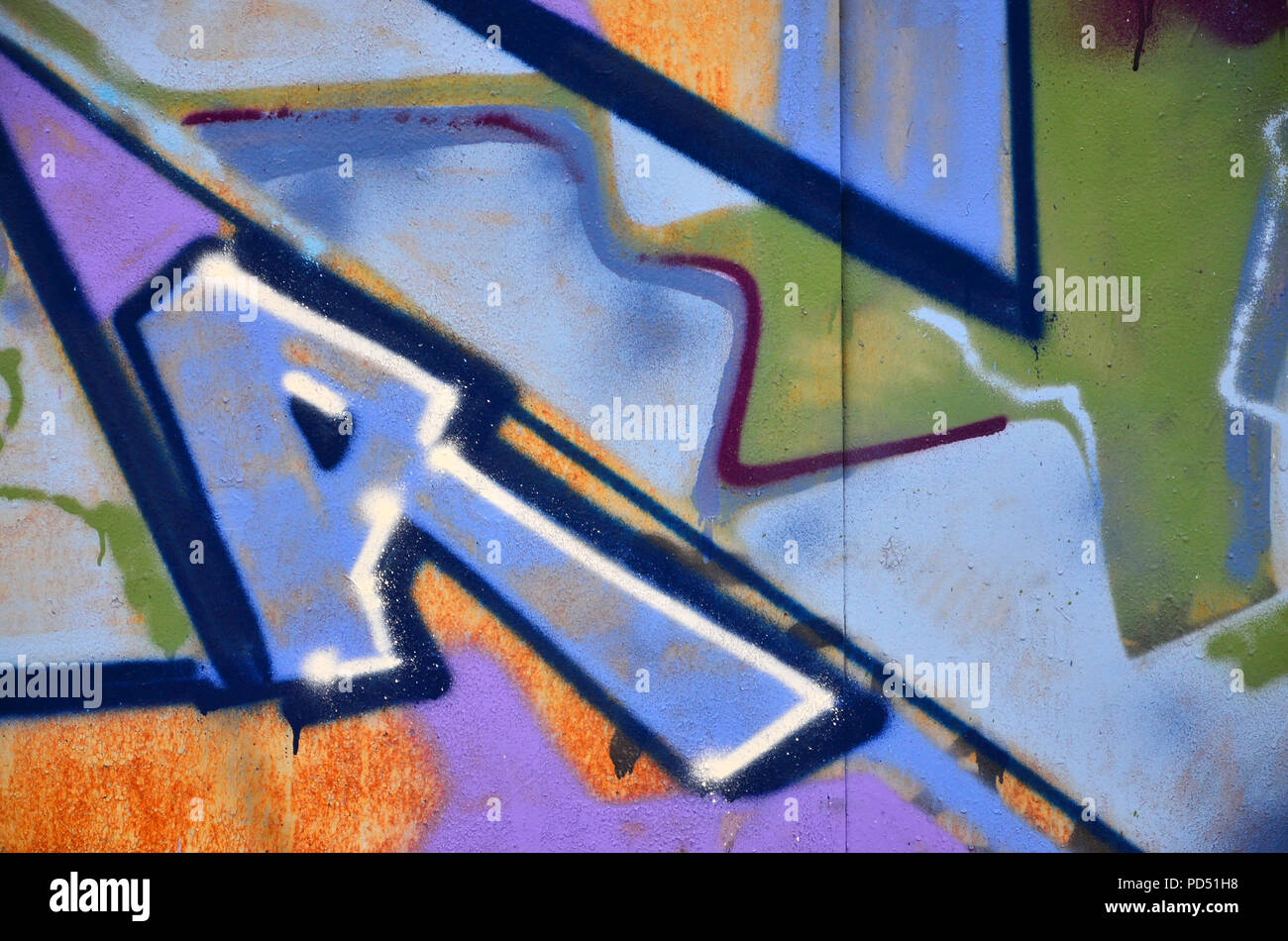 Some elements of a large and composite graffiti pattern on the wall ...