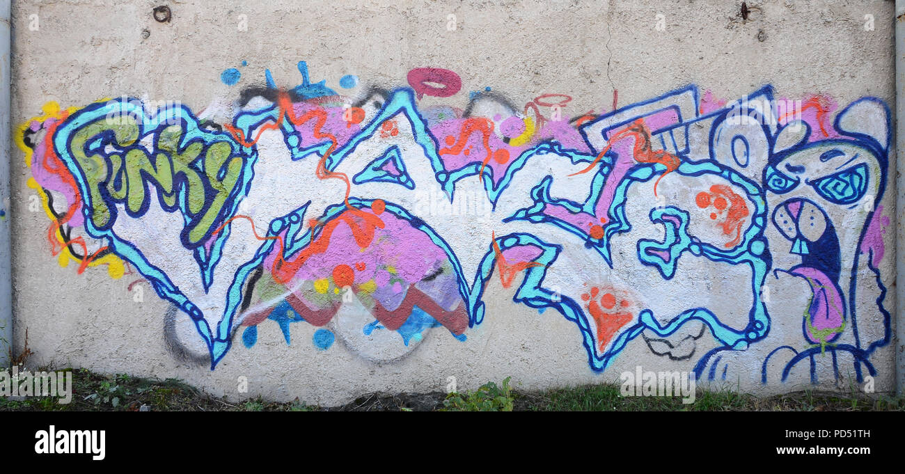 The texture of the wall with graffiti, which is depicted on it. The ...