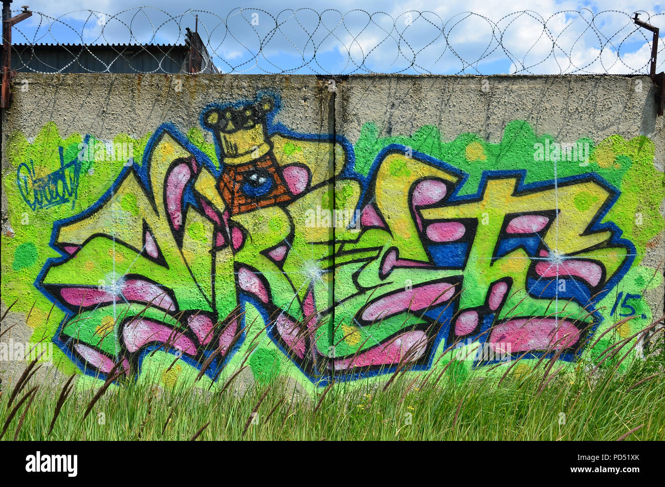 The texture of the wall with graffiti, which is depicted on it. The ...