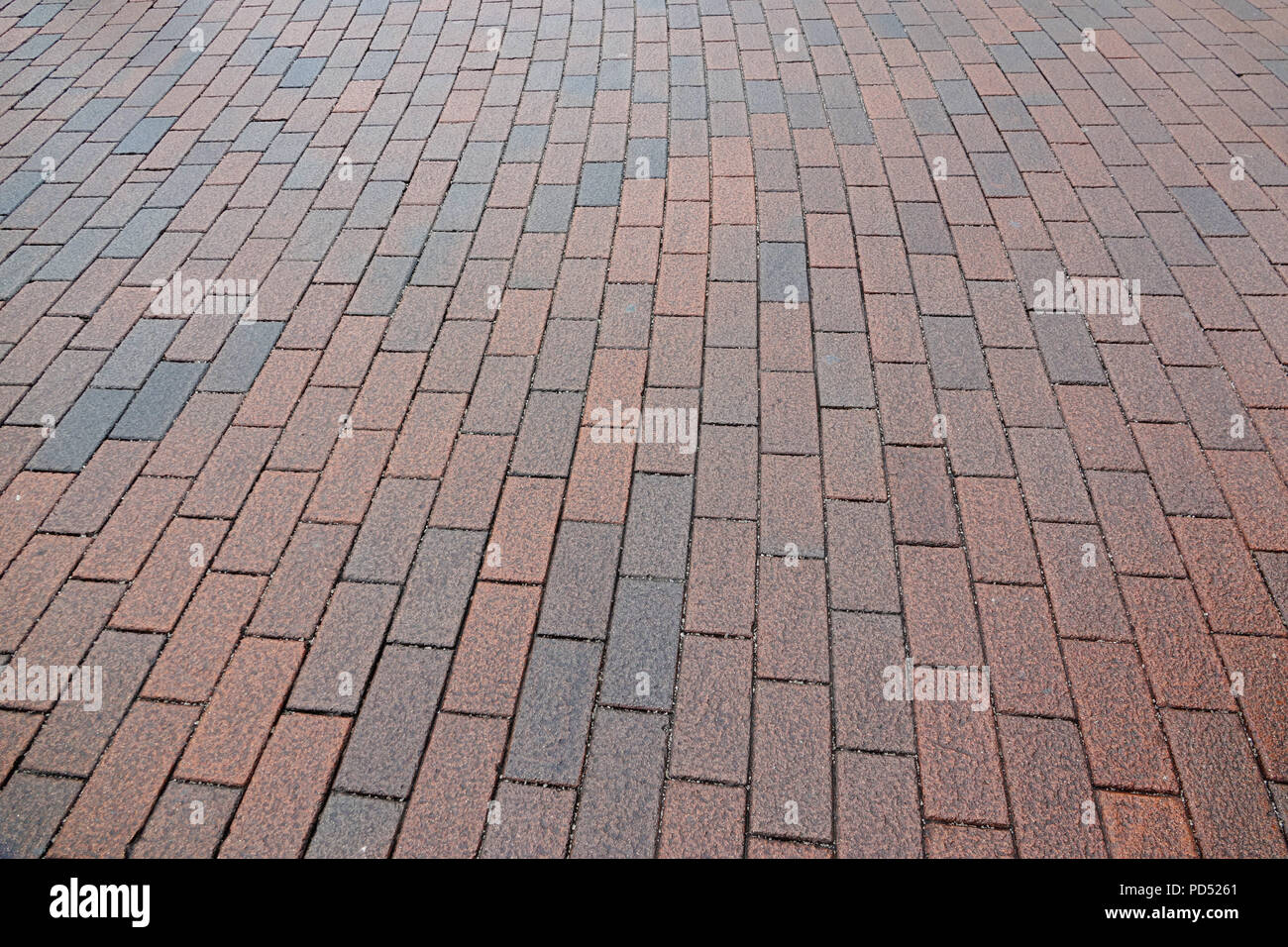 Close up of a brick road as a background Stock Photo - Alamy