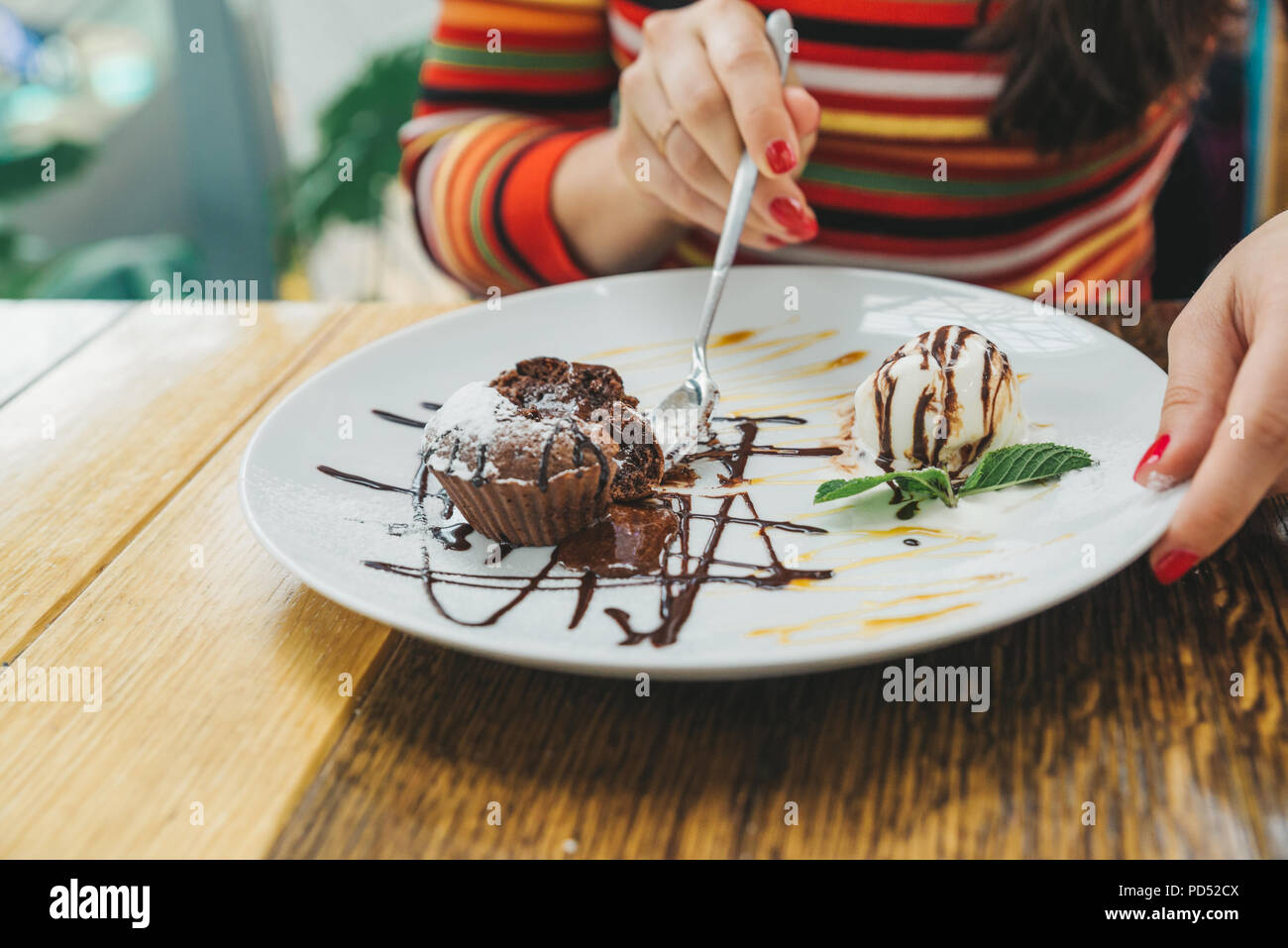 Woman eating cake in french hi-res stock photography and images - Alamy