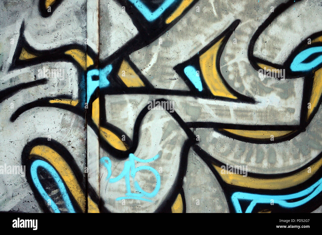 The old wall, painted in color graffiti drawing red aerosol paints ...