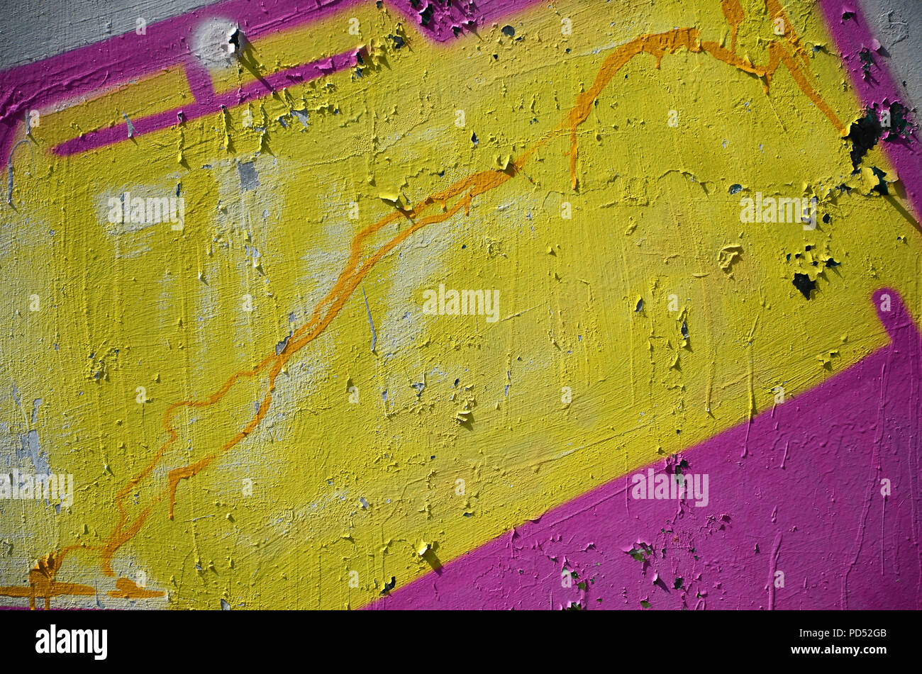 The old wall, painted in color graffiti drawing red aerosol paints ...