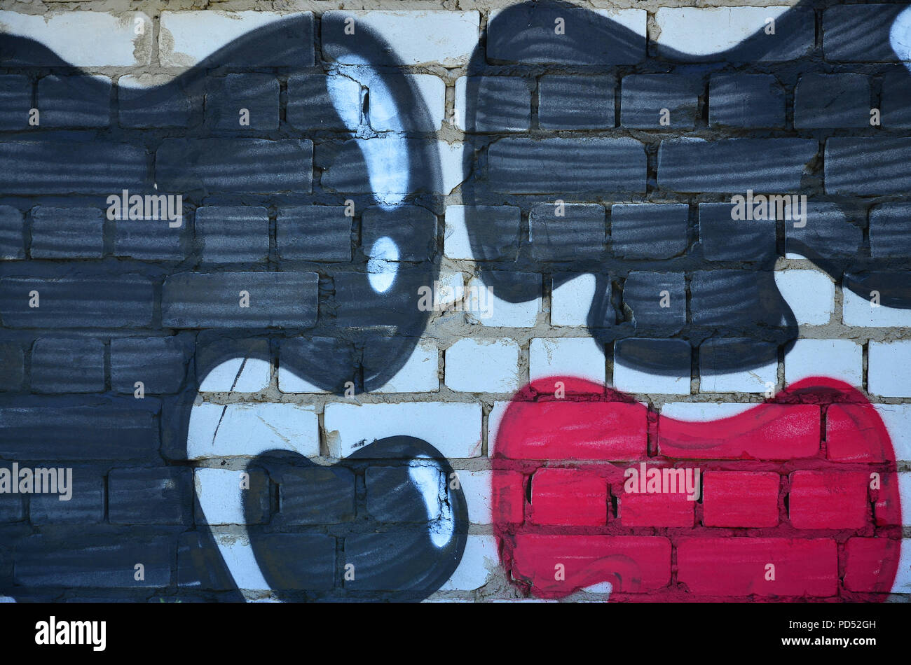 Fragment of an old colored graffiti drawing on the wall. Background ...