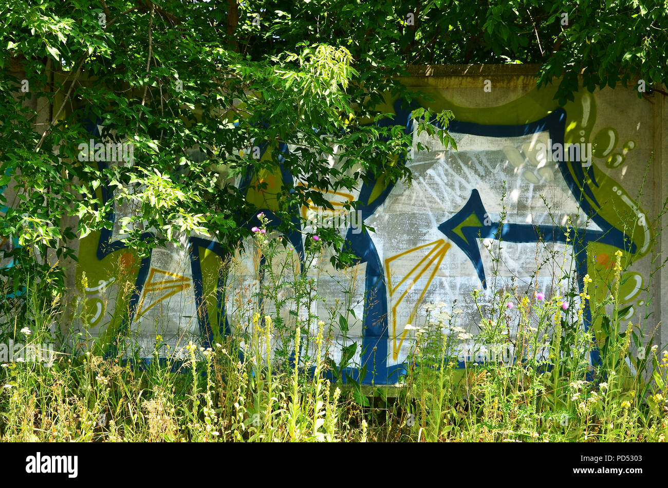 The texture of the wall with graffiti, which is depicted on it. The ...