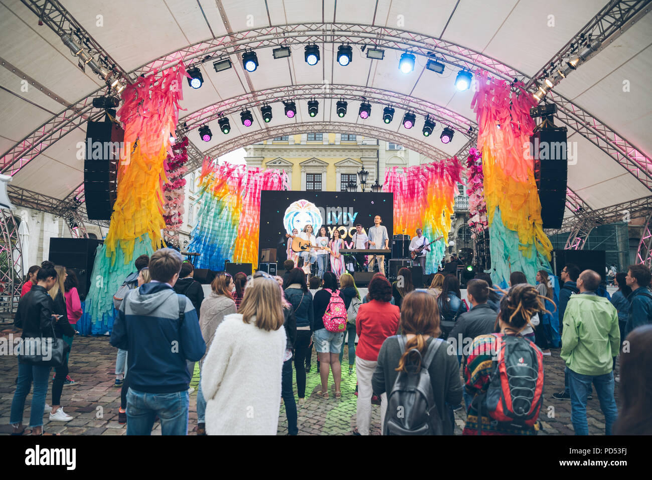LVIV, UKRAINE - June 23, 2018: people listening music from the scene ...