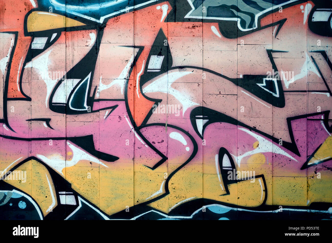 A fragment of detailed graffiti of a drawing made with aerosol paints ...