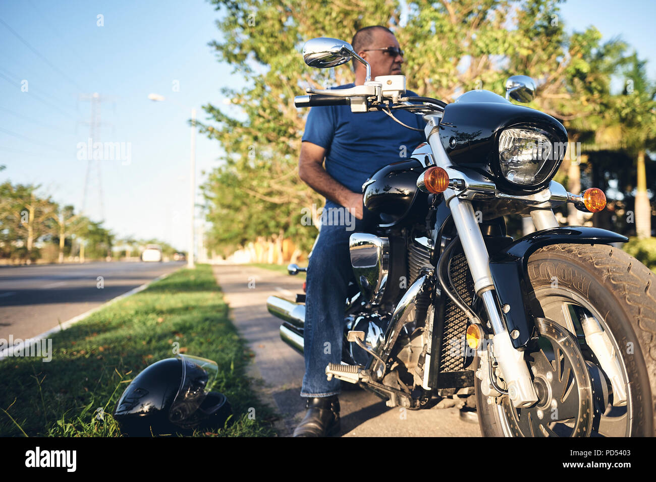 Fat man riding motorcycle hi-res stock photography and images - Alamy