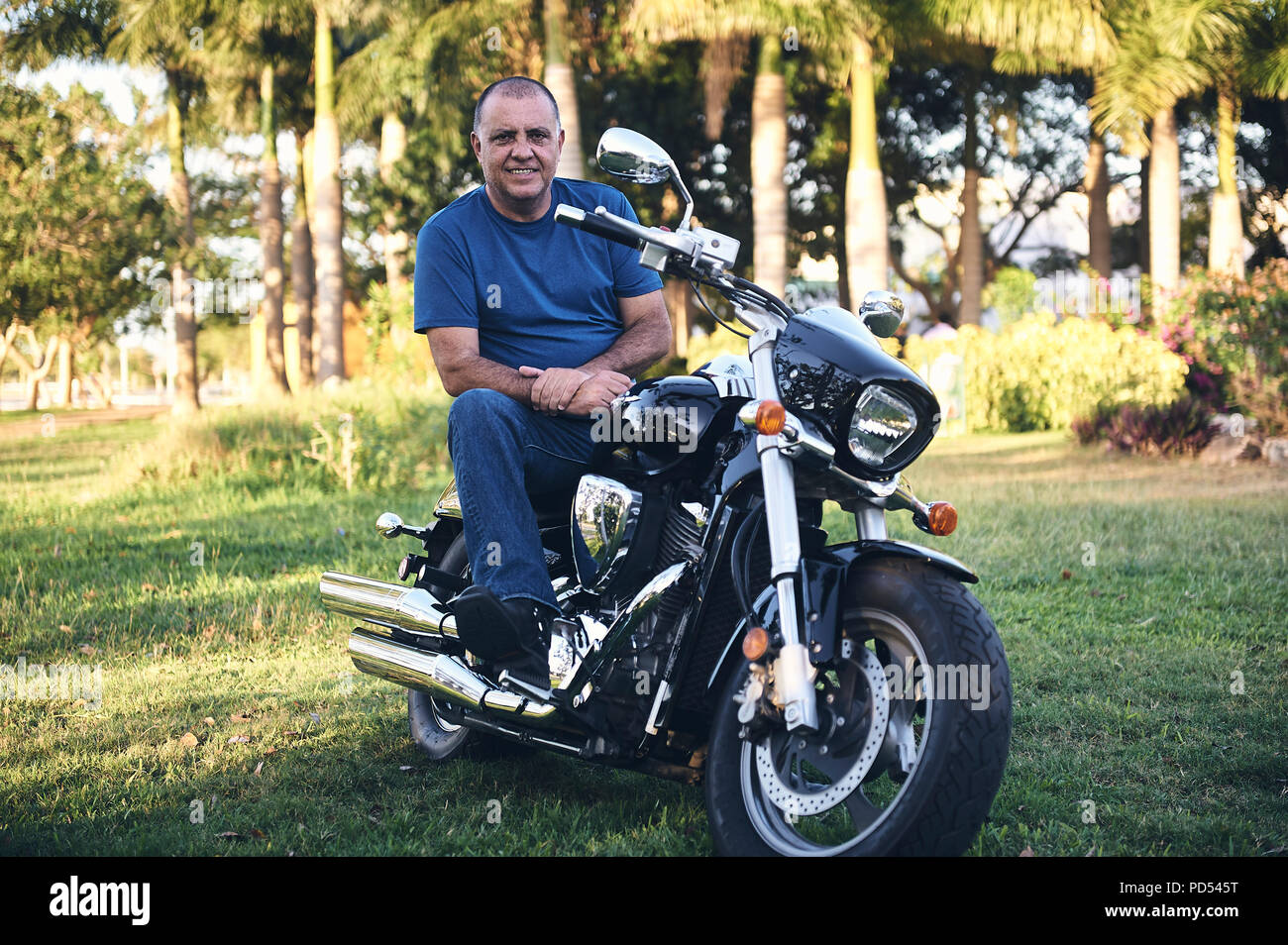Fat man on motorcycle hi-res stock photography and images - Alamy