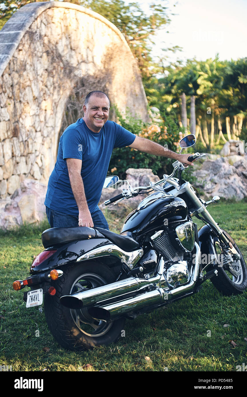 Fat man riding motorcycle hi-res stock photography and images - Alamy