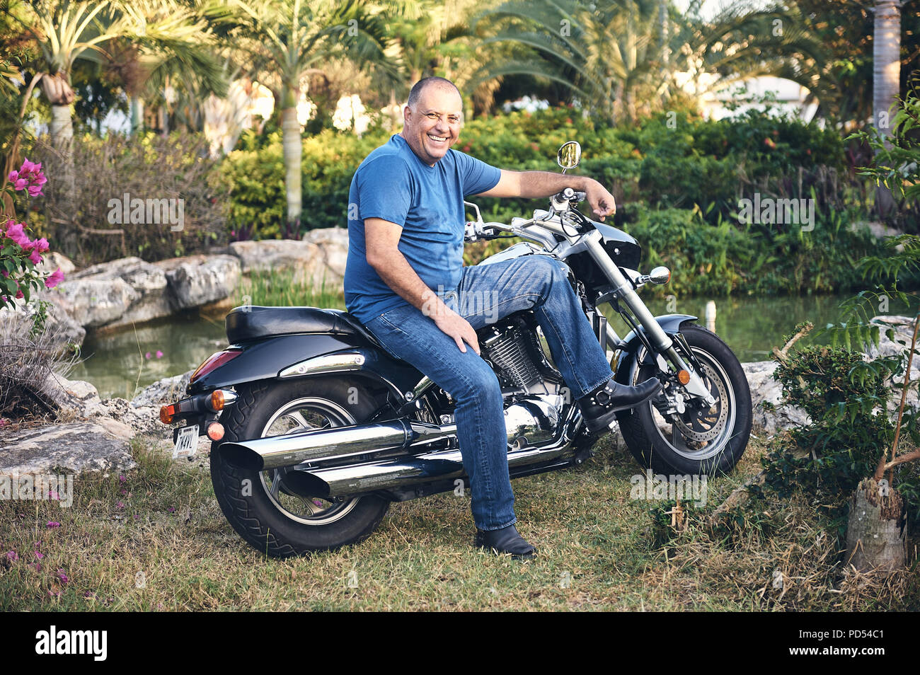 Fat man riding motorcycle hi-res stock photography and images - Alamy