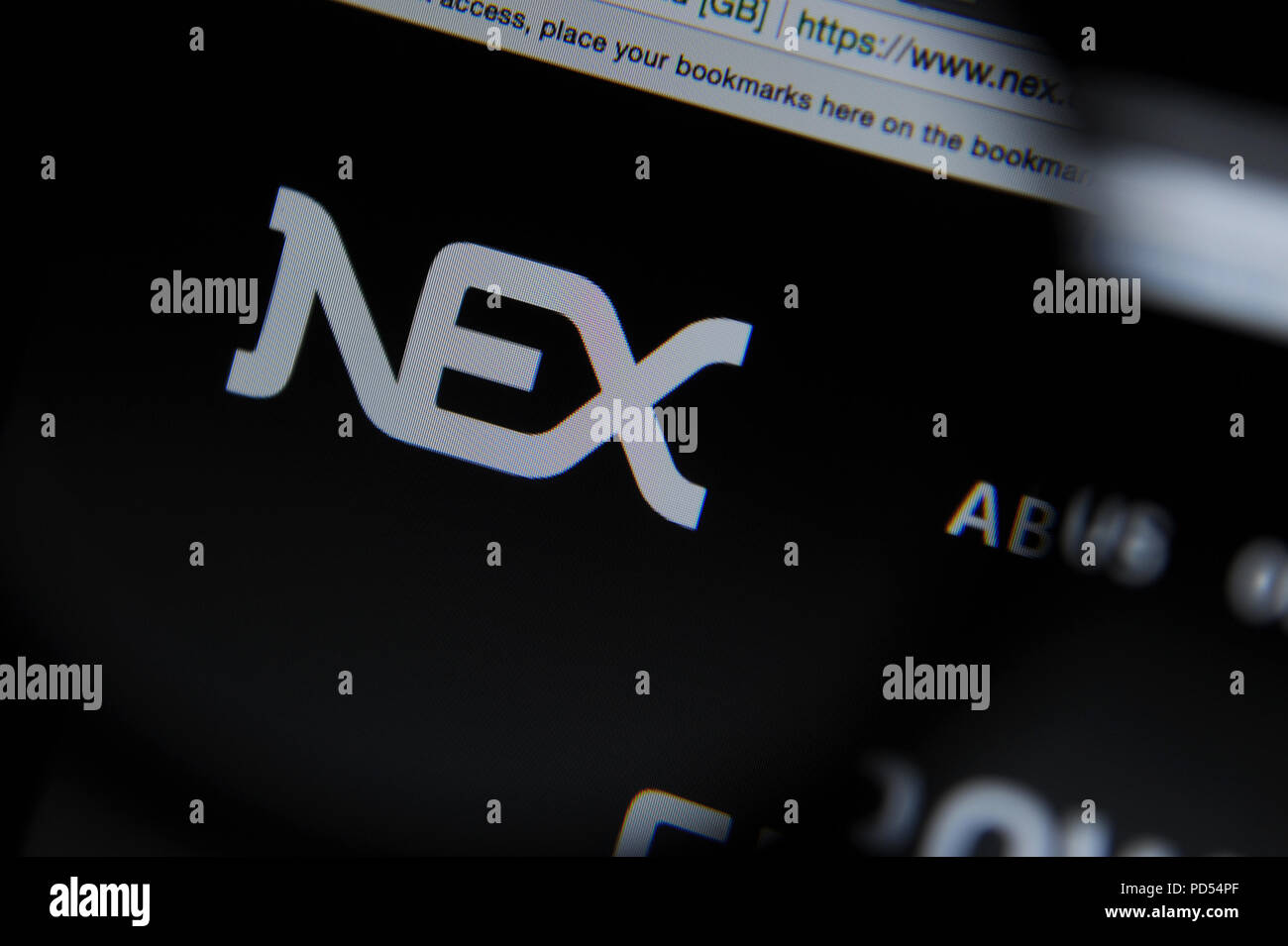 The NEX website seen through a magnifying glass Stock Photo - Alamy