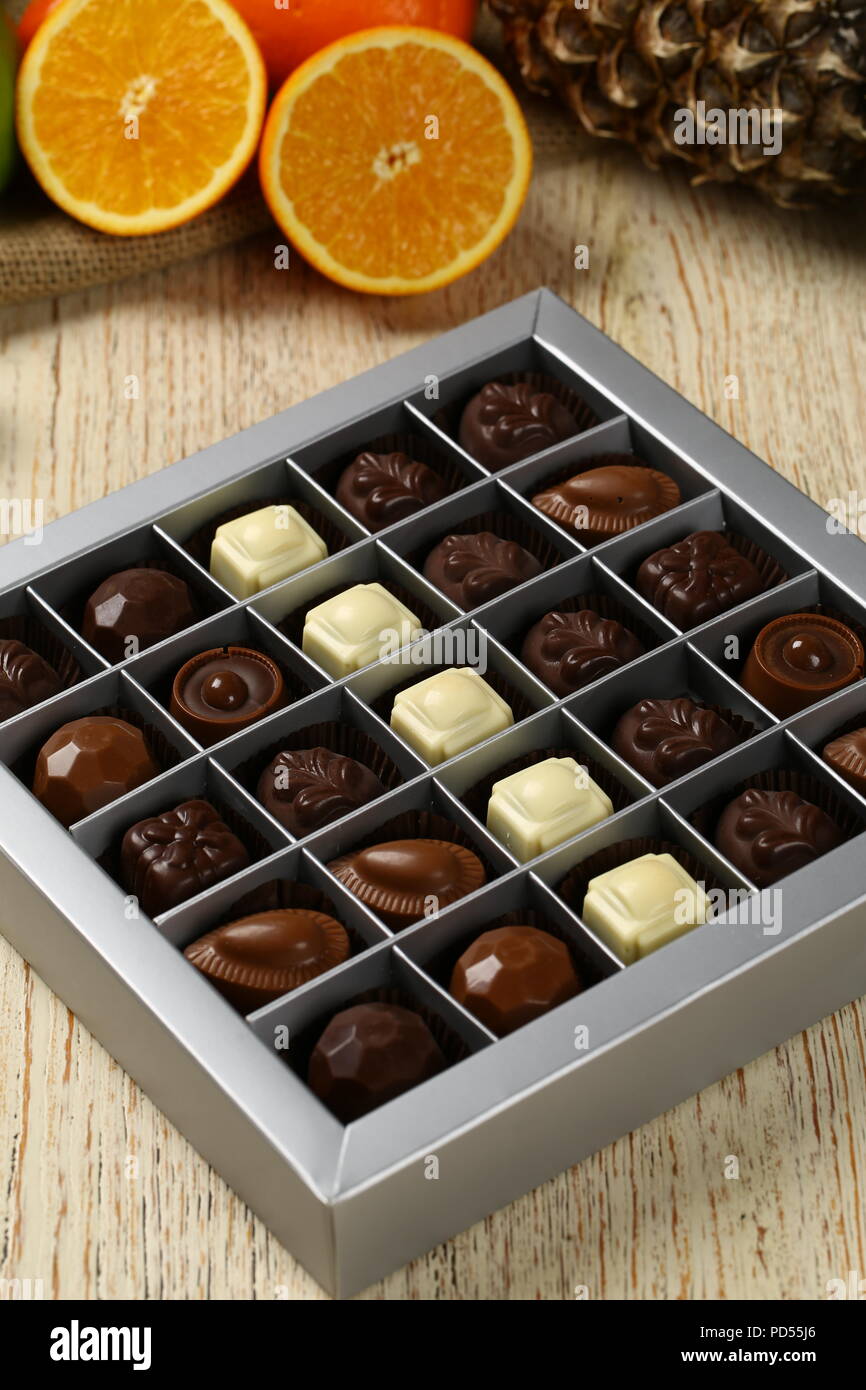 Gray Box of assorted luxury chocolate with truffles and pralines Stock ...