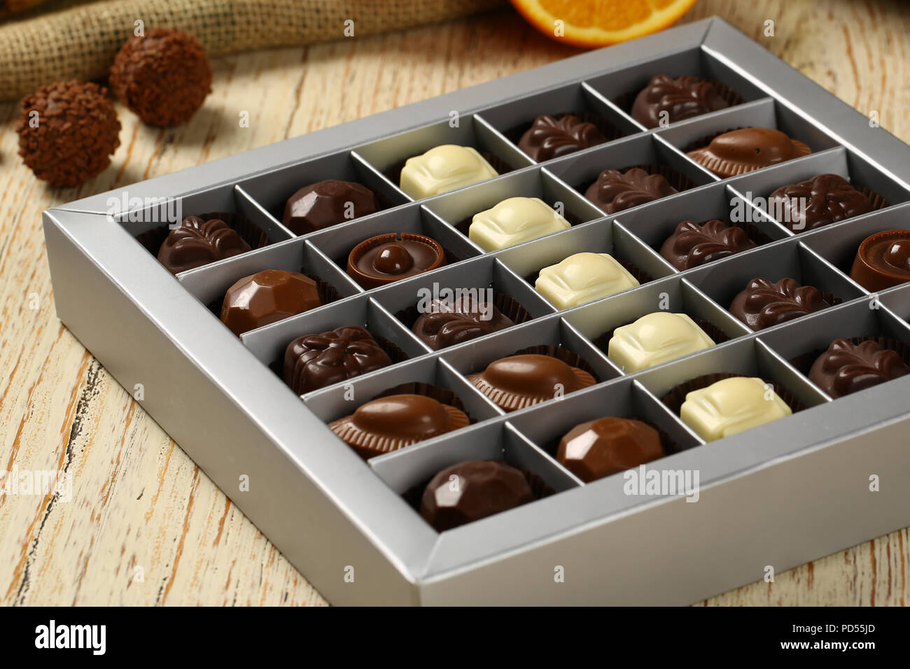 Gray Box of assorted luxury chocolate with truffles and pralines Stock ...