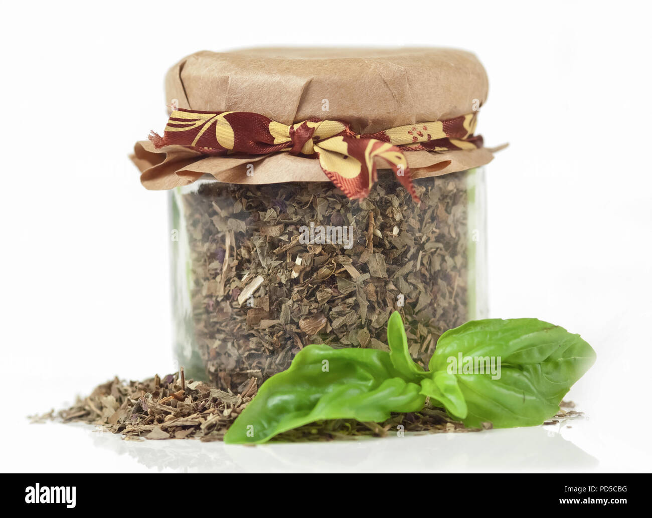 Fresh and dried basil on white background Stock Photo - Alamy