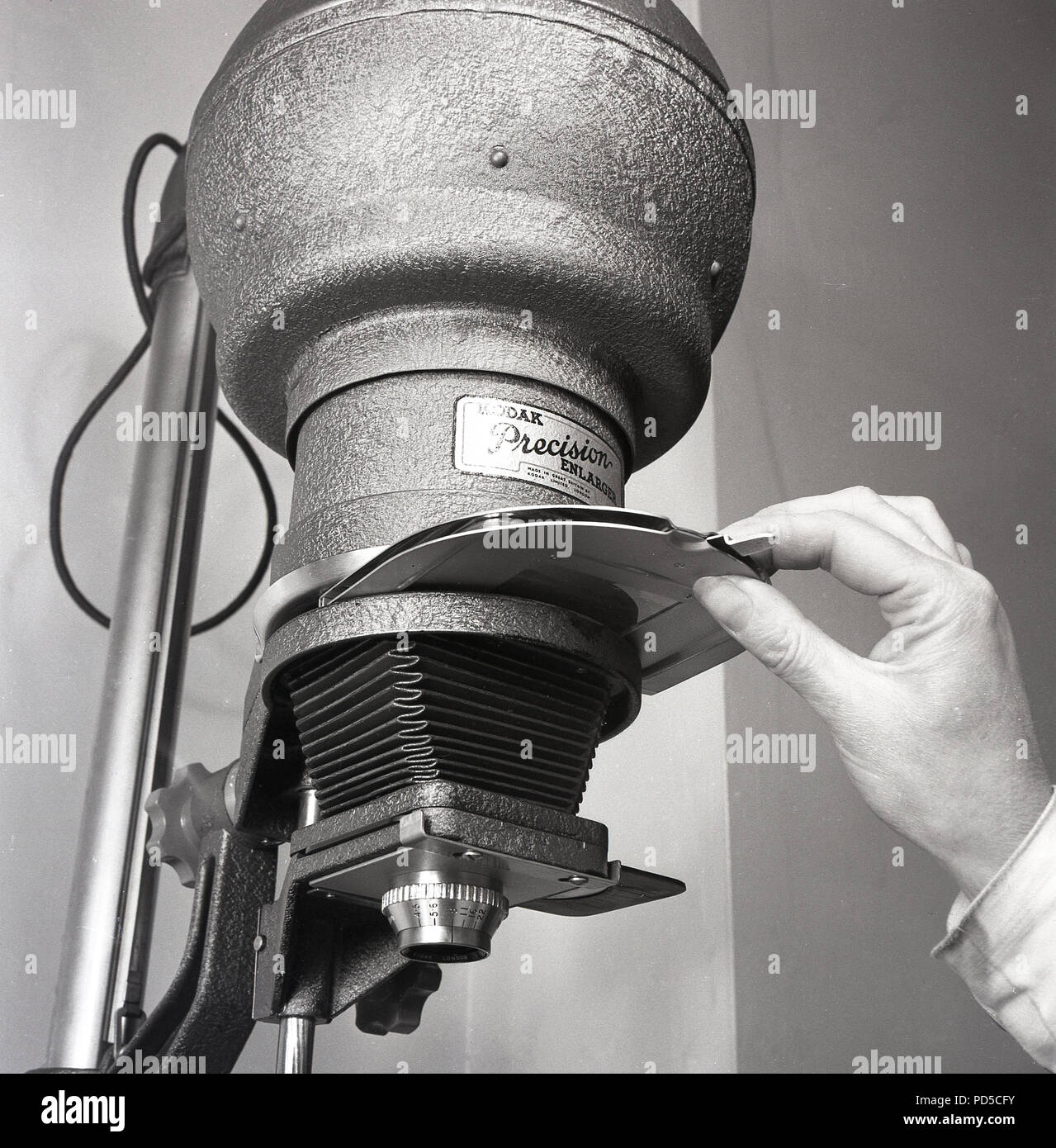 1950s, upright chrome-plated diffusion photographic film enlarger, with ...