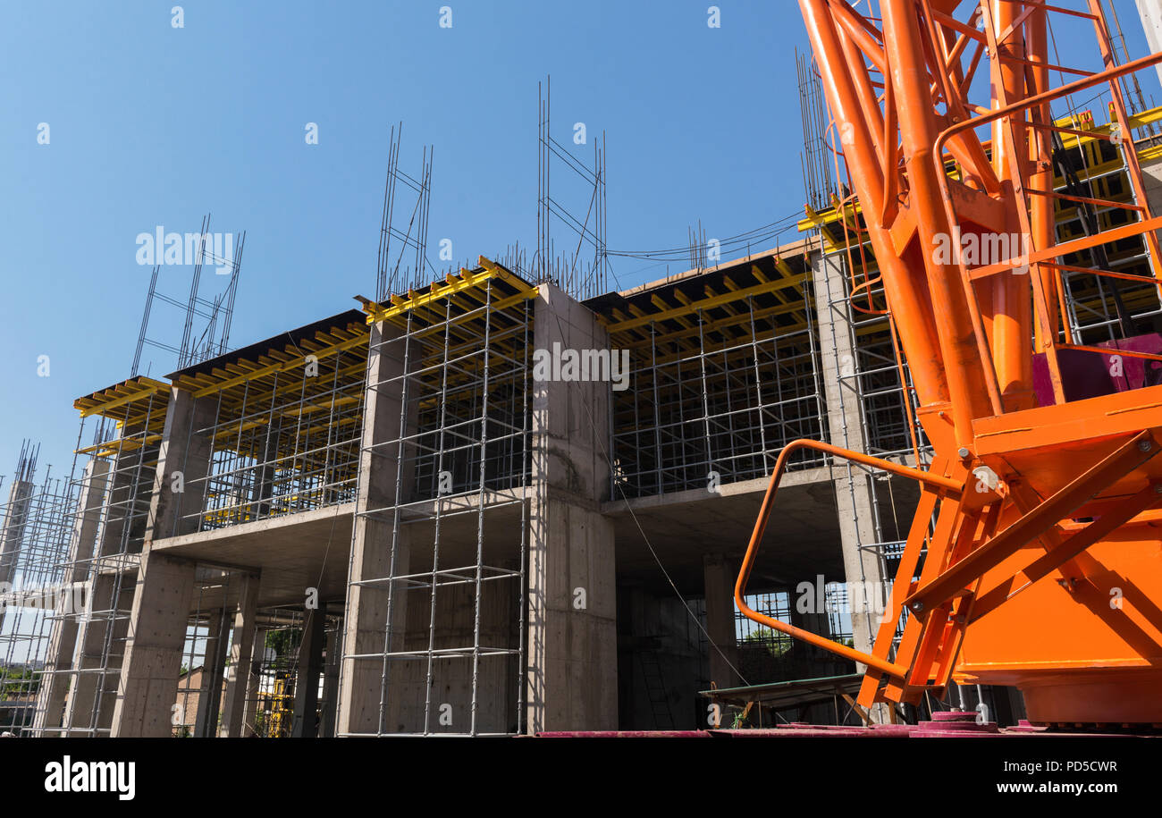 construction crane and a concrete structure of the building Stock Photo ...