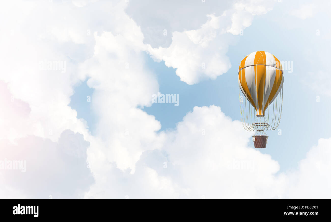 Flying hot air balloon in the air Stock Photo - Alamy