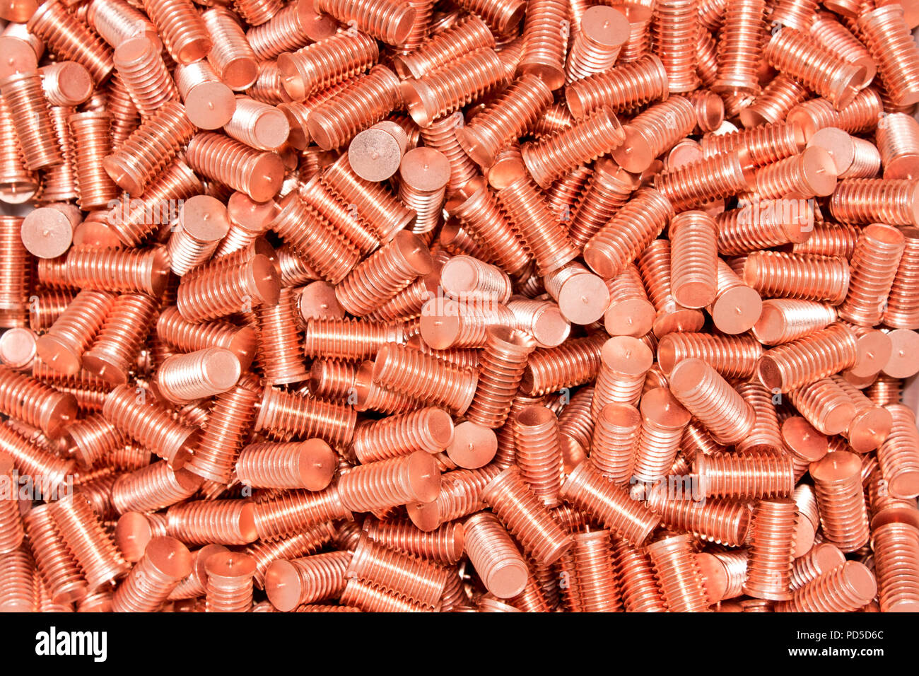 Pile of threaded copper metal screw bolts Stock Photo - Alamy