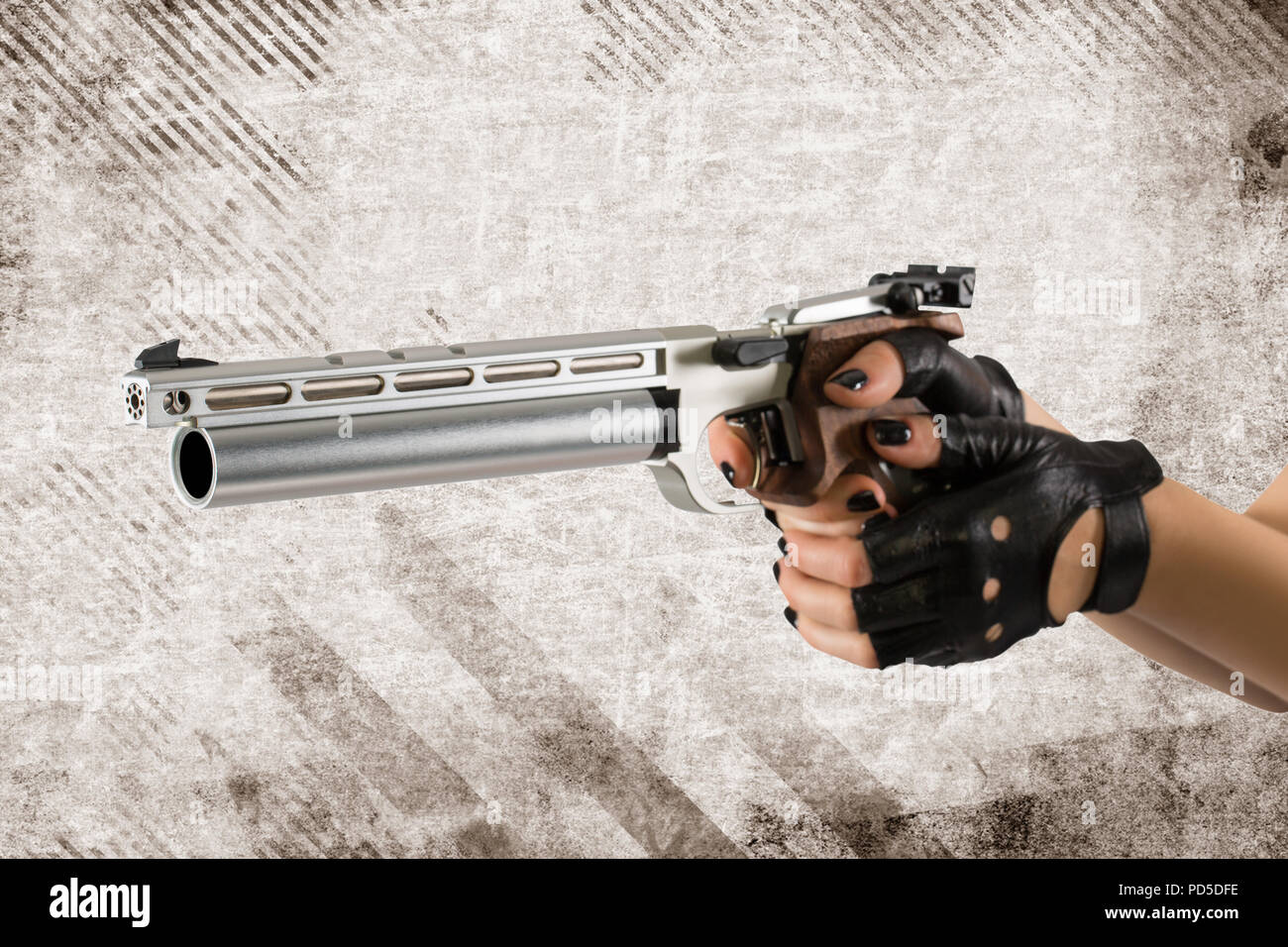 Woman holding revolver hi-res stock photography and images - Alamy