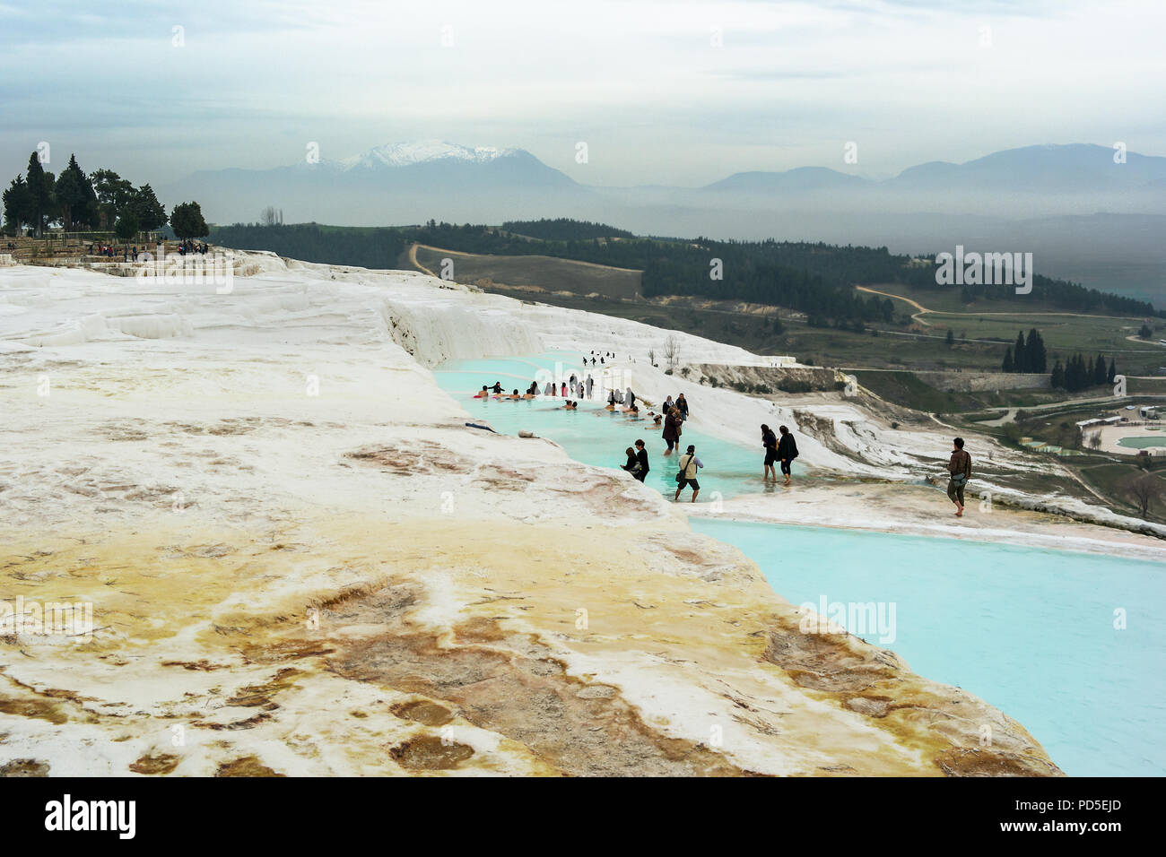 A view across Pamukkale's travertine terraces and the bathing pools ...