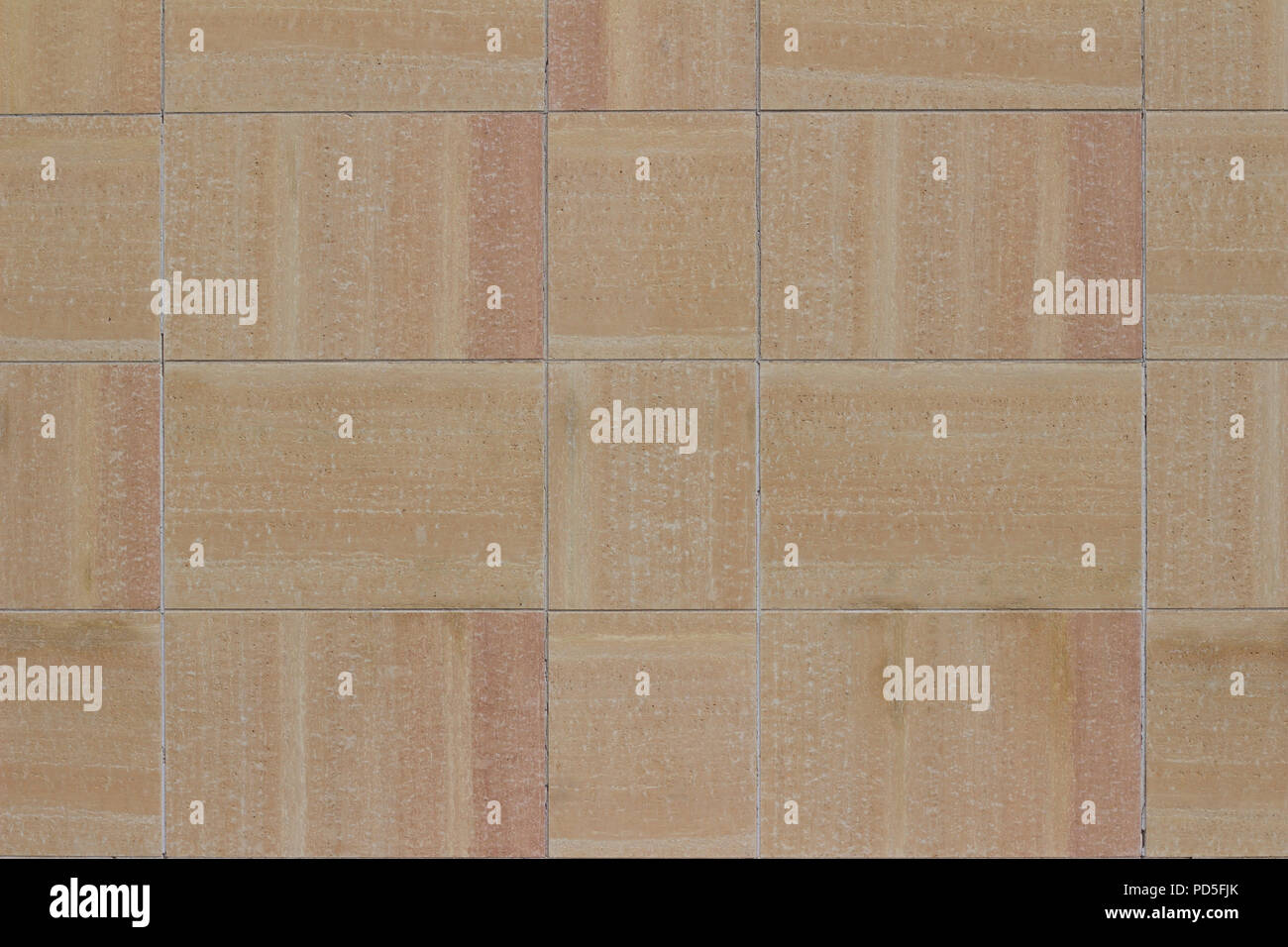 Attractive tile block stone wall background with striated blocks in ...