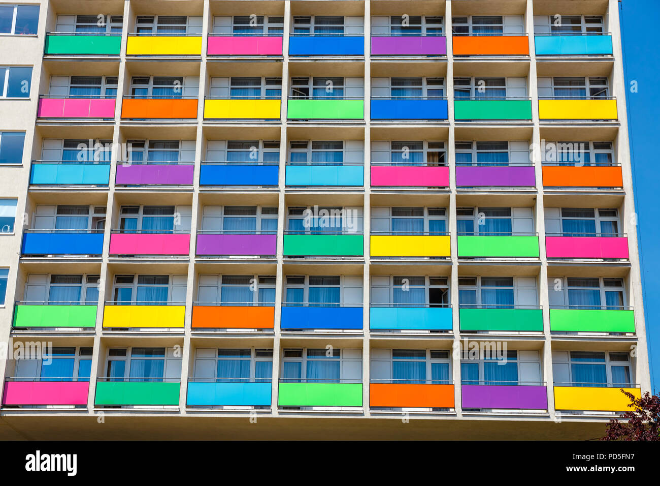 building with multi-colored balconies Stock Photo - Alamy
