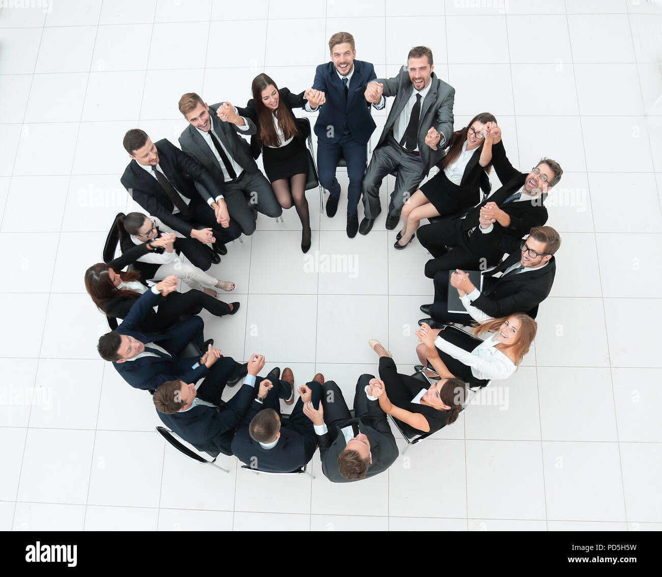 concept of team building .large successful business team sitting in a ...