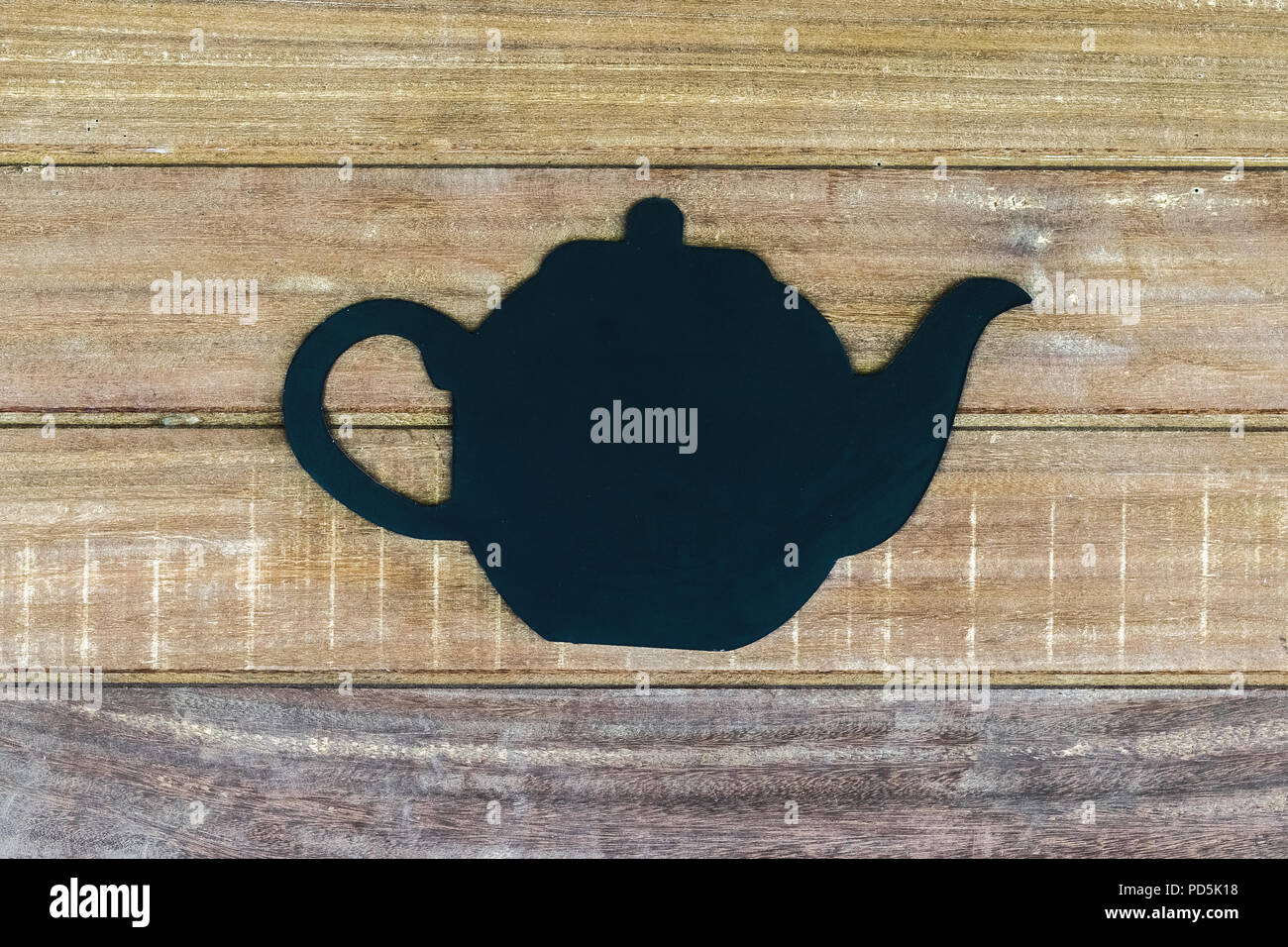 Teapot shape on the wall Stock Photo - Alamy