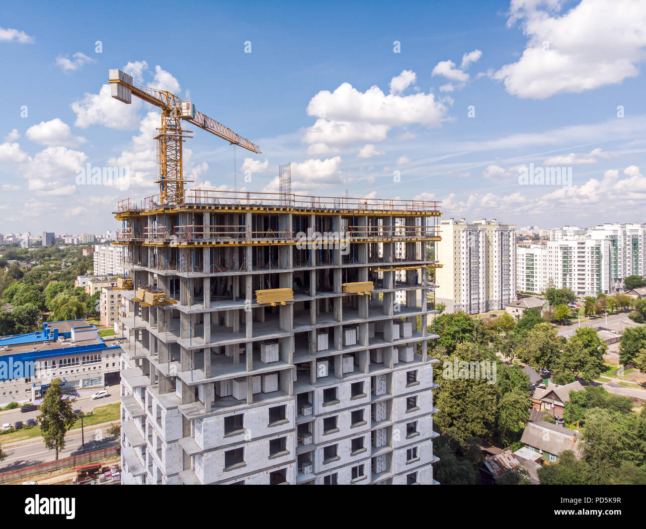 aerial top view of multilevel apartment building under construction ...