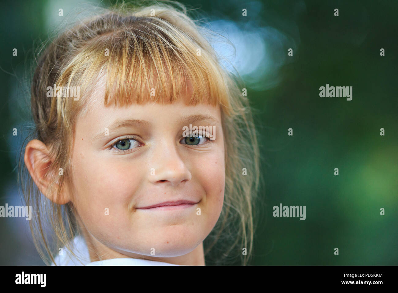little girl's face closeup, kid's portrait, smiling child Stock Photo ...