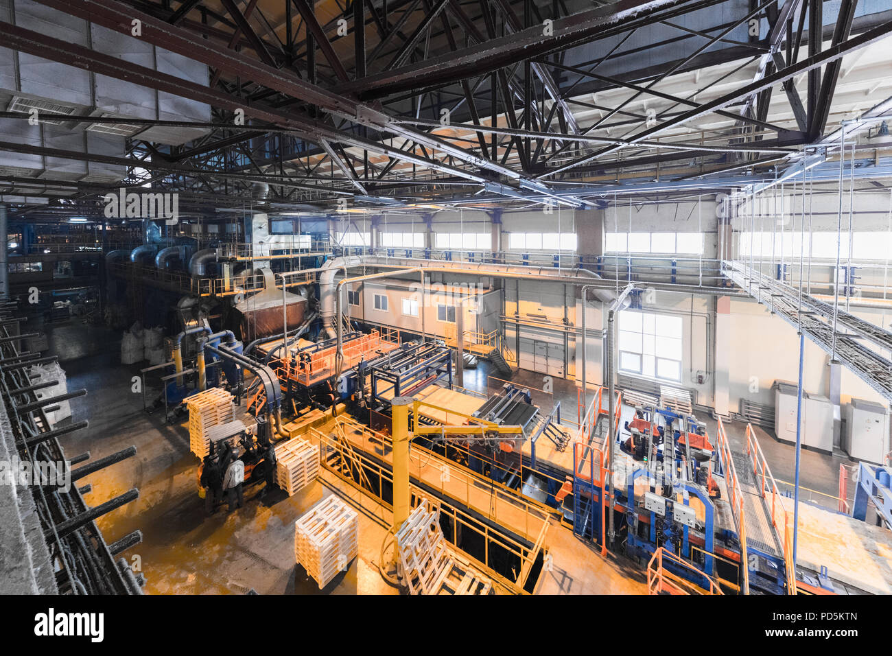 Fiberglass production industry equipment at manufacture background ...