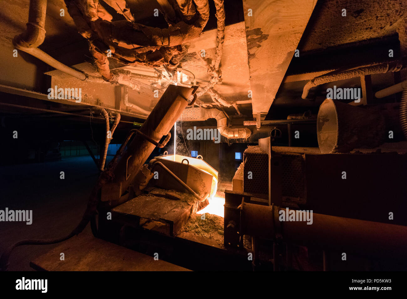 Process of fiberglass production at manufacture background with ...