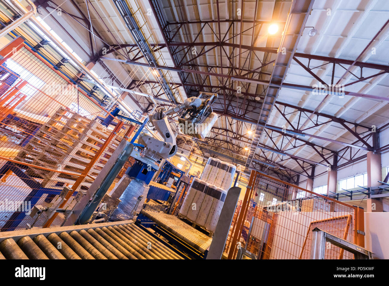 Fiberglass production industry equipment at manufacture background ...