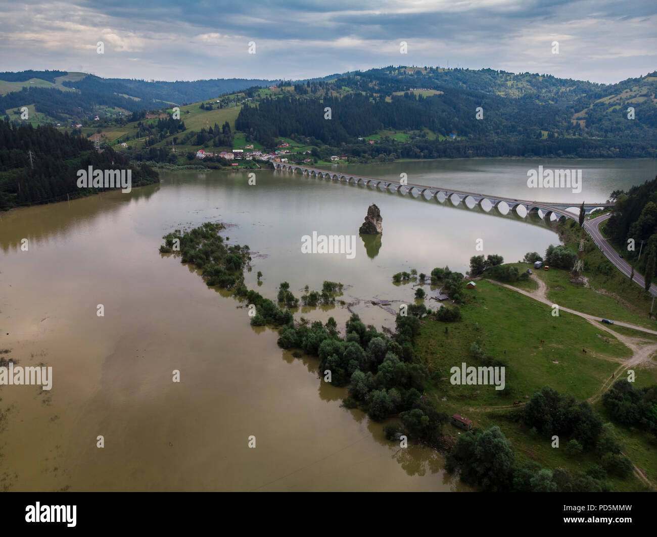 flooded water. Bicaz lake and viaduct, Romania Stock Photo - Alamy