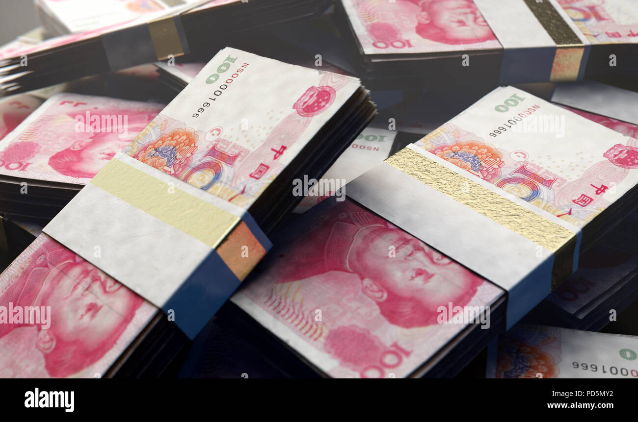 A pile of randomly scattered bundles of chinese yuan banknotes on an ...