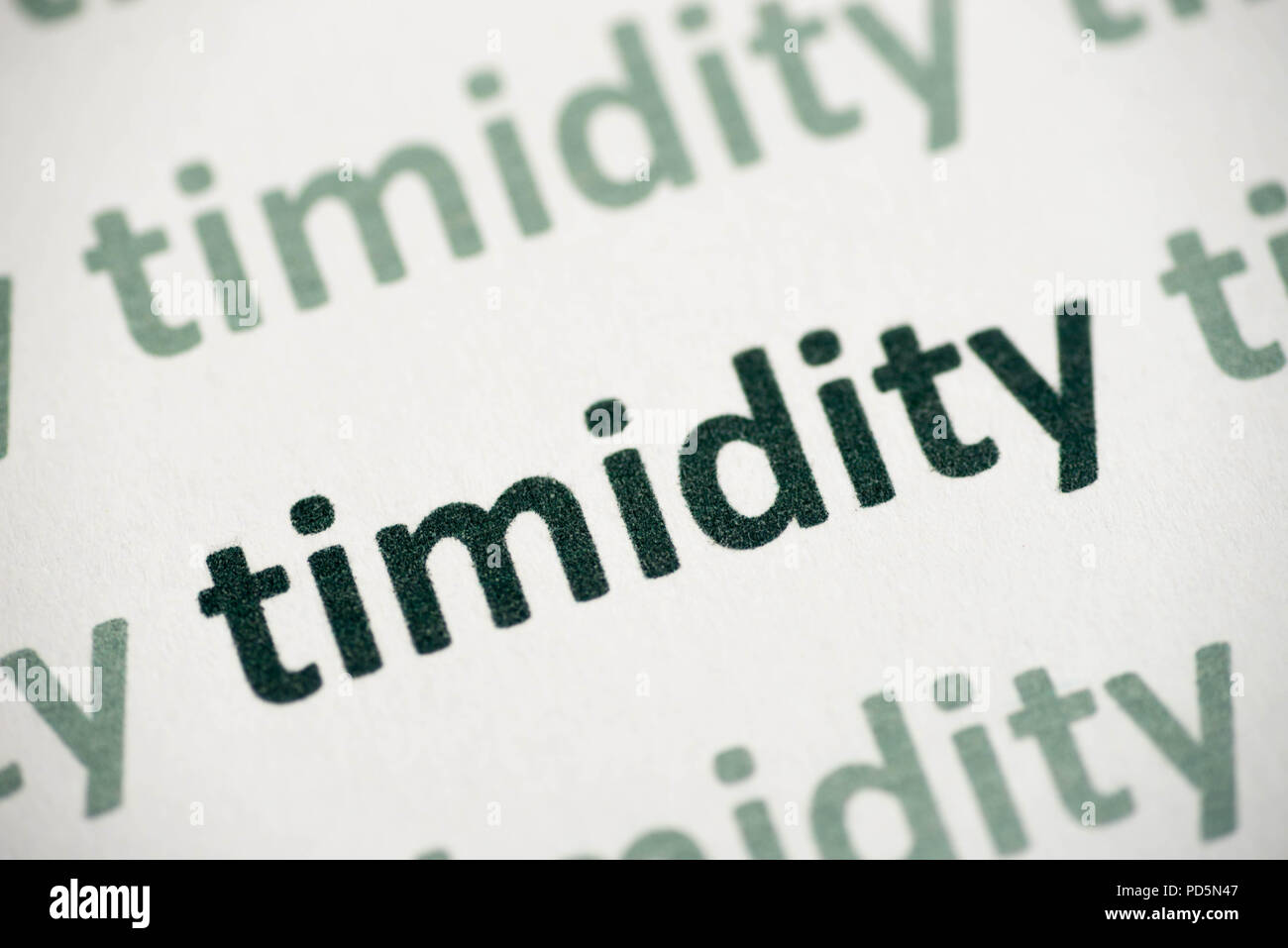 word timidity printed on white paper macro Stock Photo - Alamy