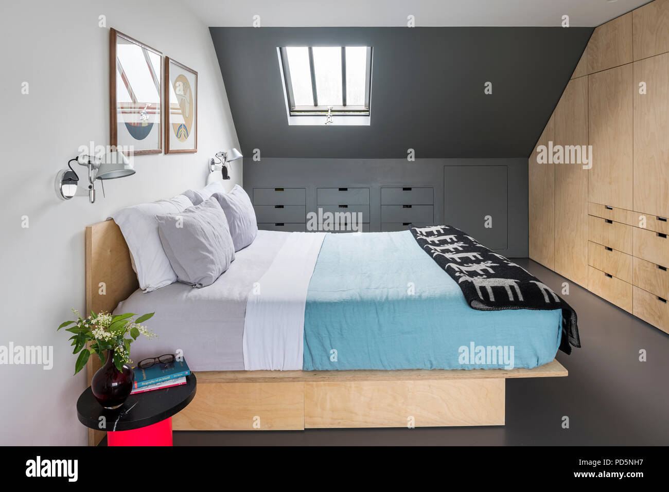 Inbuilt storage in minimal and contemporary bedroom Stock Photo - Alamy