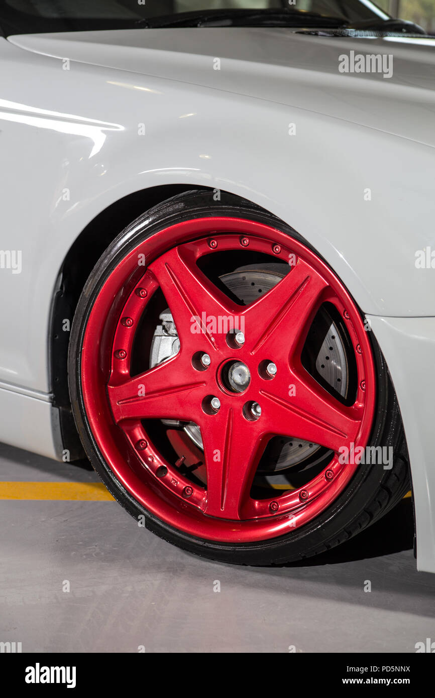 Candy Red Painted Custom Car Alloy Wheel Rim Stock Photo - Alamy