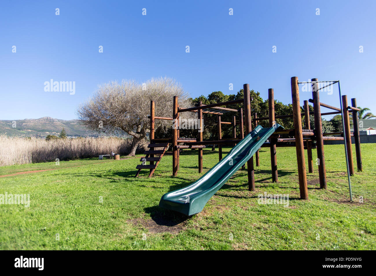 Jungle Gym and Slide at a children's play park Stock Photo - Alamy