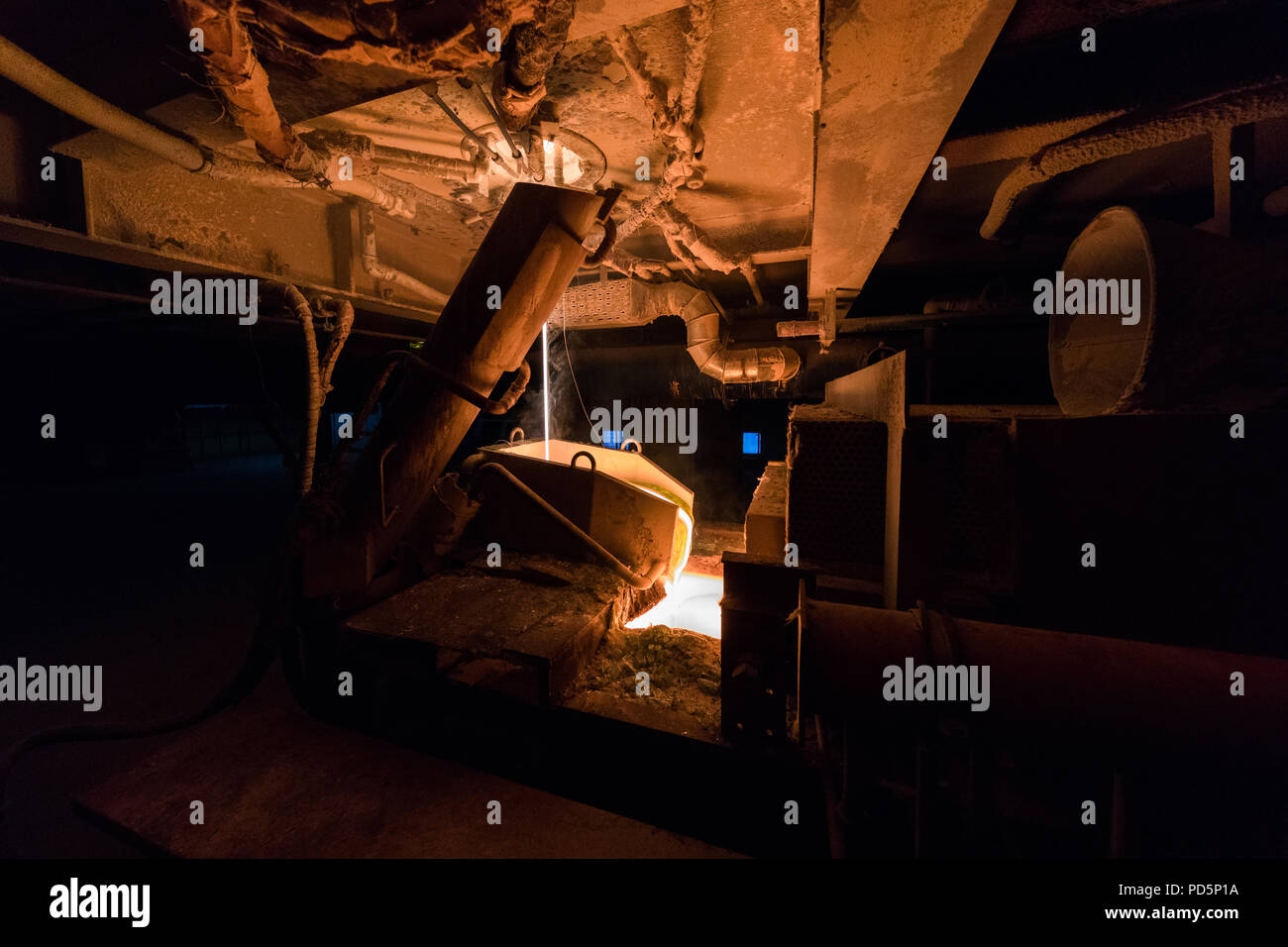 Process of fiberglass production at manufacture background with ...