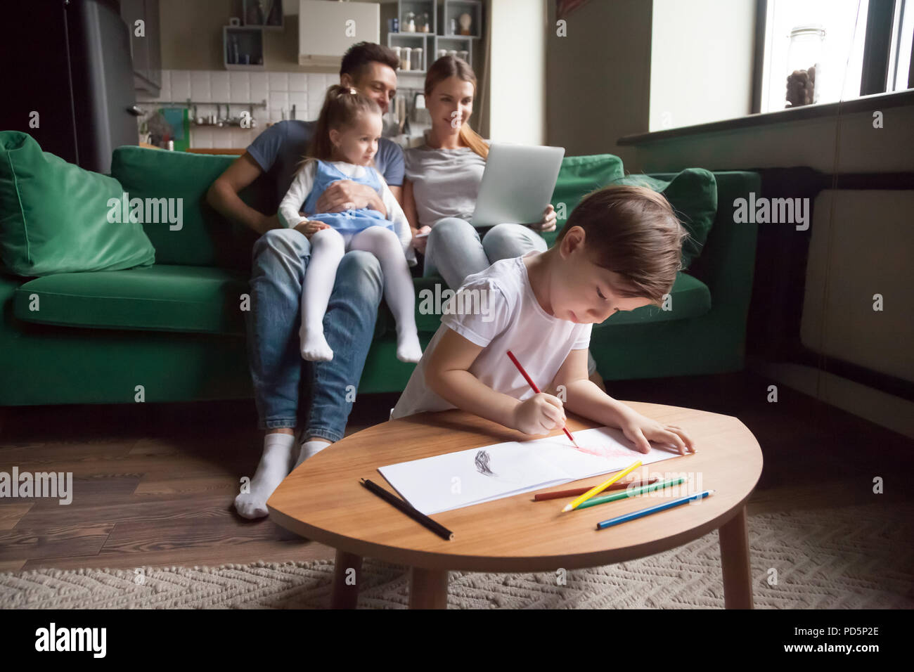 Family with children hobbies and activities at home on weekend Stock ...