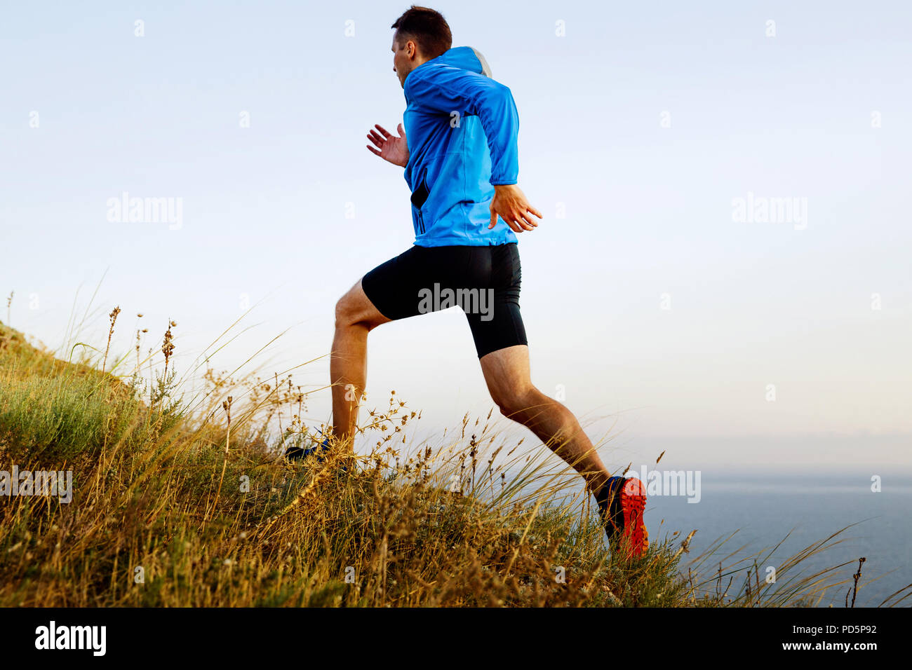run up mountain autumn men athlete runner Stock Photo - Alamy