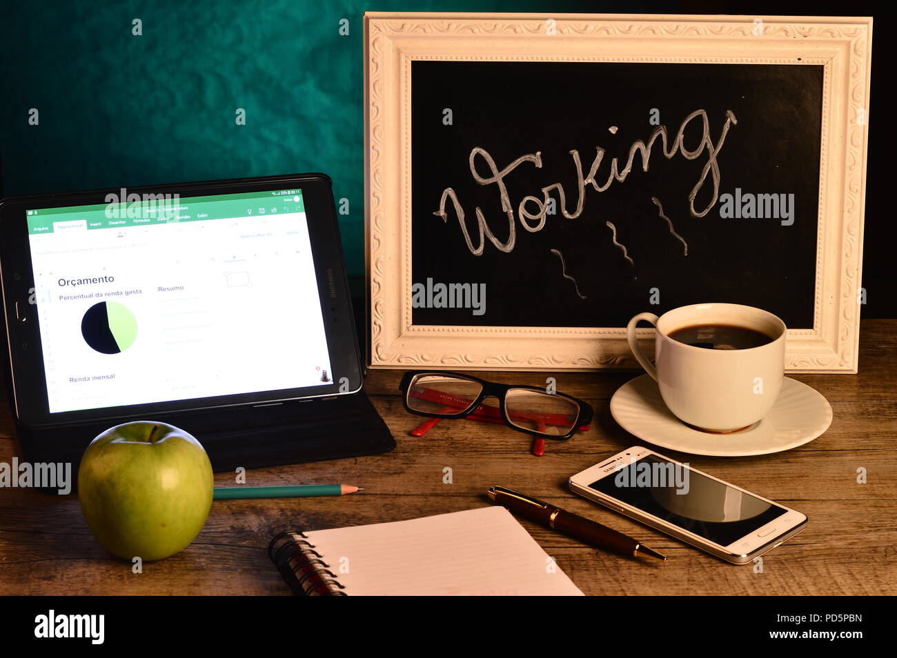 Working at a coffee table hi-res stock photography and images - Alamy